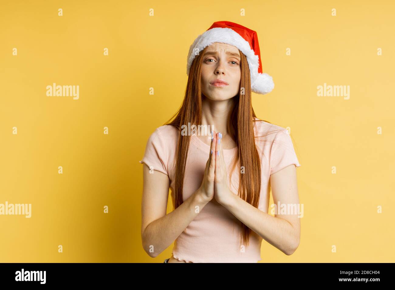 Woman pleading look hi-res stock photography and images - Alamy