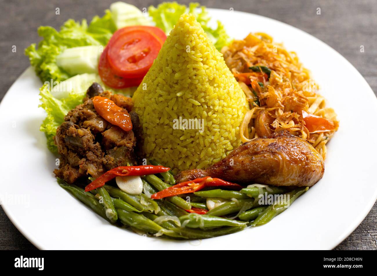 Delicious and tasty Yellow Rice with chicken and vegetables Stock Photo ...