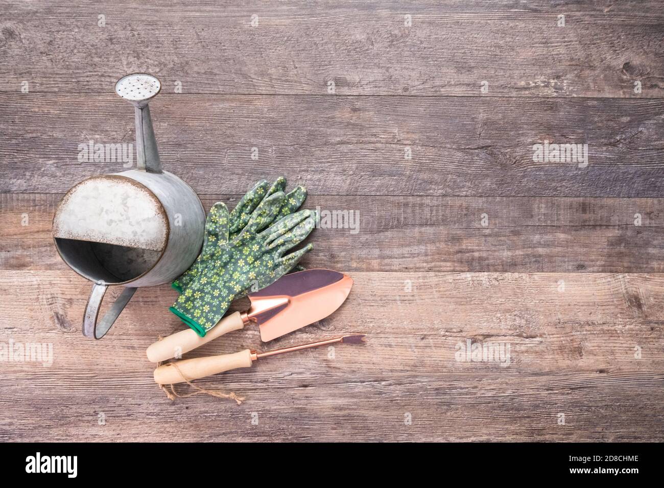 Flat lay. Small garden tools are ready for Spring planting season ...
