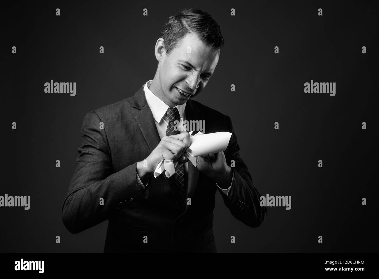 Man ripping paper hi-res stock photography and images - Alamy