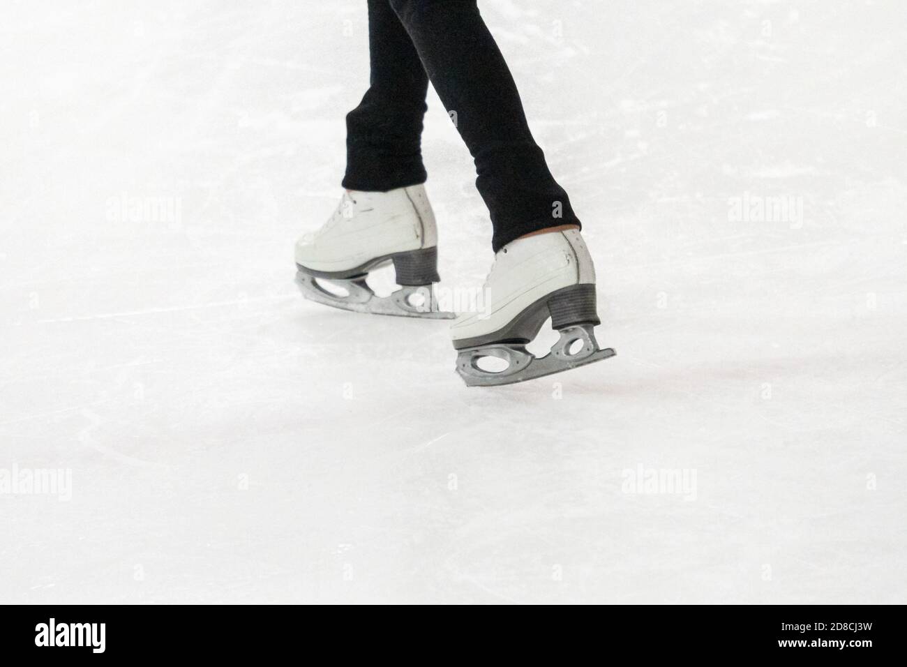 View of figure skater feet at the figure skating practice Stock Photo ...
