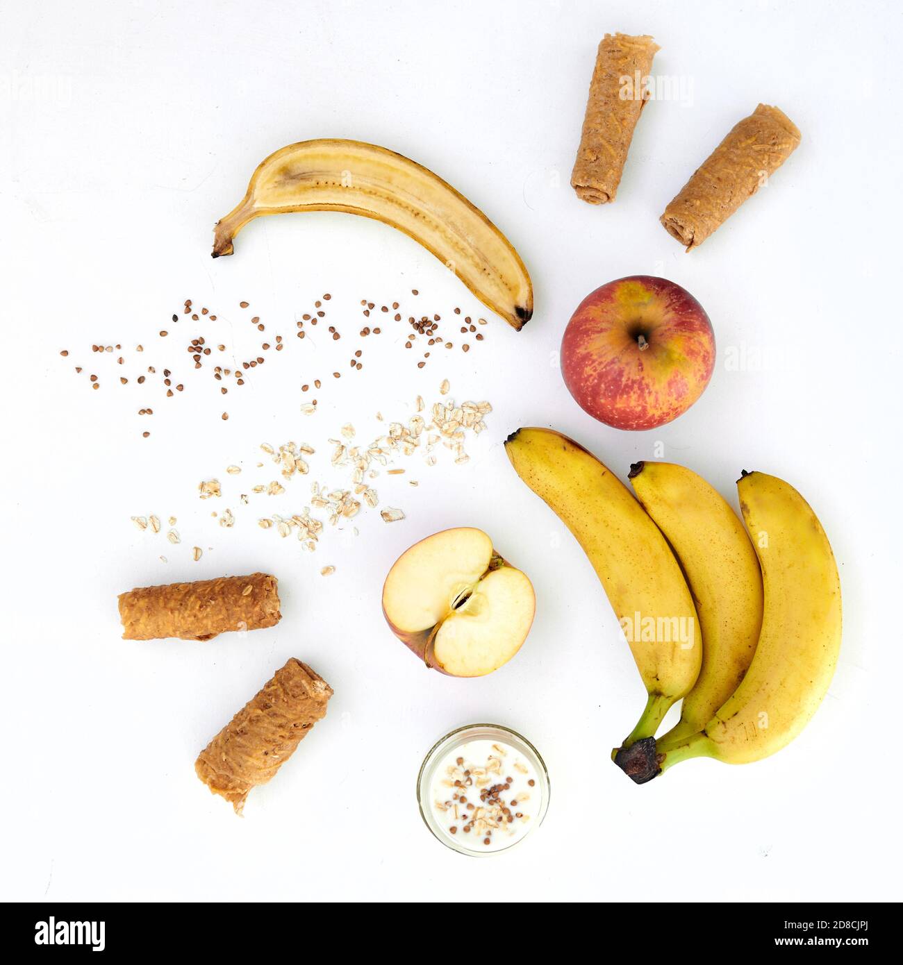 Flat lay of various dried and fresh fruits on a white background ...