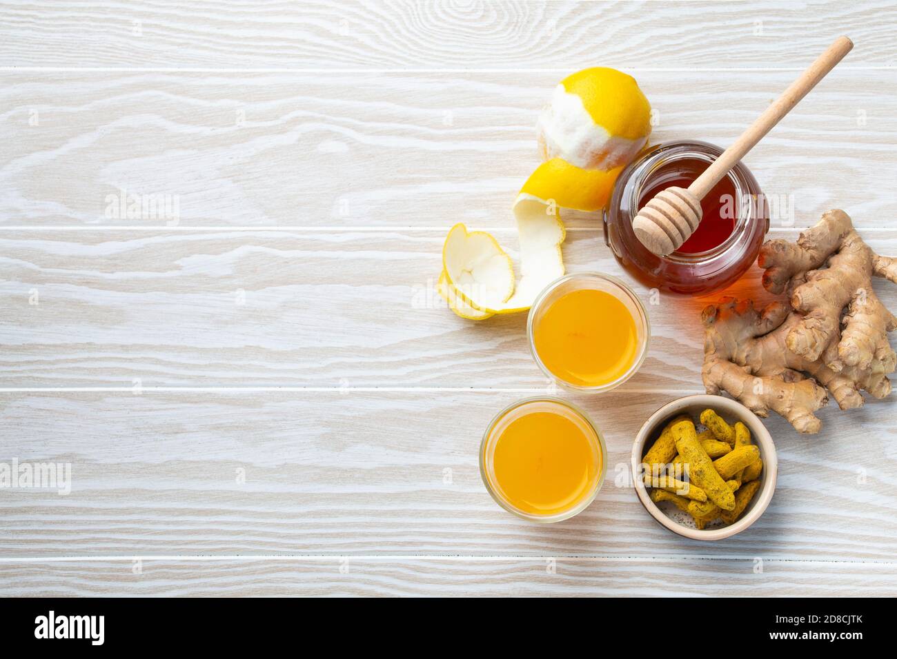 Turmeric lemon honey beverage Stock Photo - Alamy