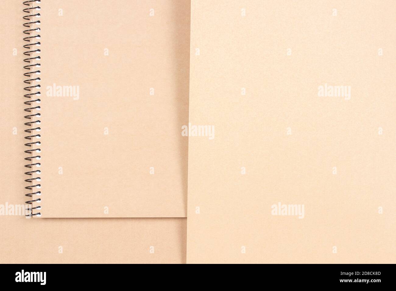 Craft paper background with spiral notebook. Abstract minimal ...