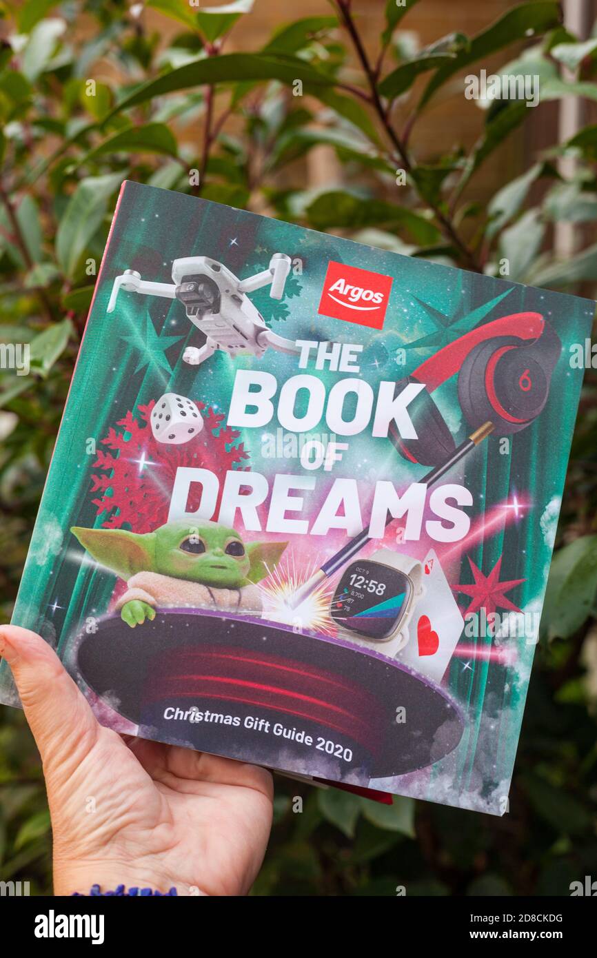 Hand holding a 2020 Argos Catalogue (Book of Dreams Christmas Gift ...