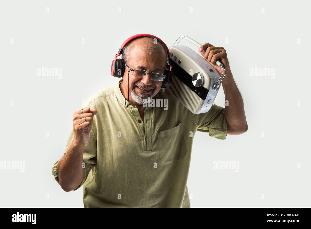 Old man tuning radio hi-res stock photography and images - Alamy