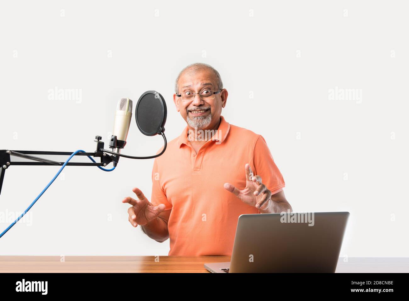 Aged man vlogger recording video hi-res stock photography and images ...