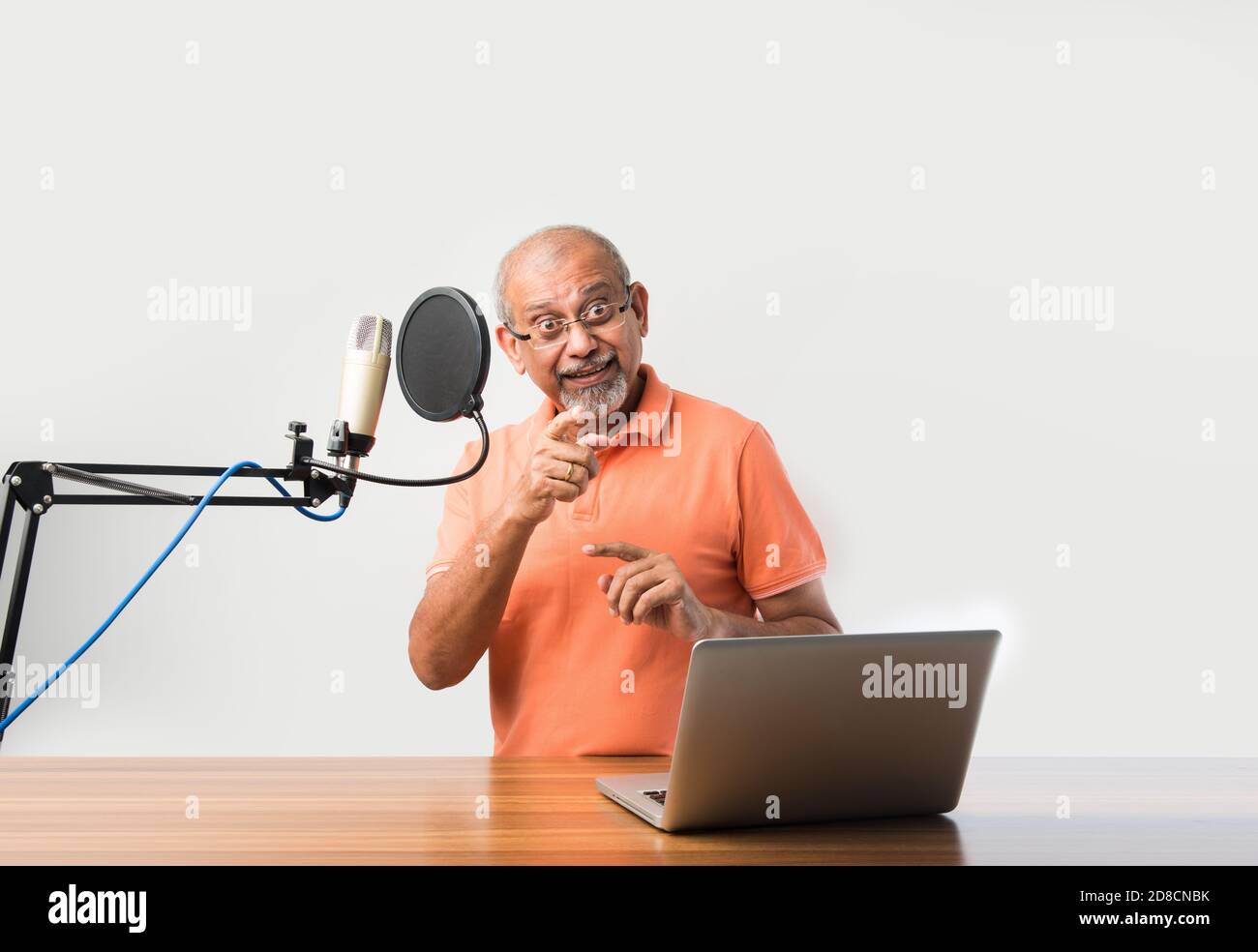 Indian male presenter speaking hi-res stock photography and images - Alamy
