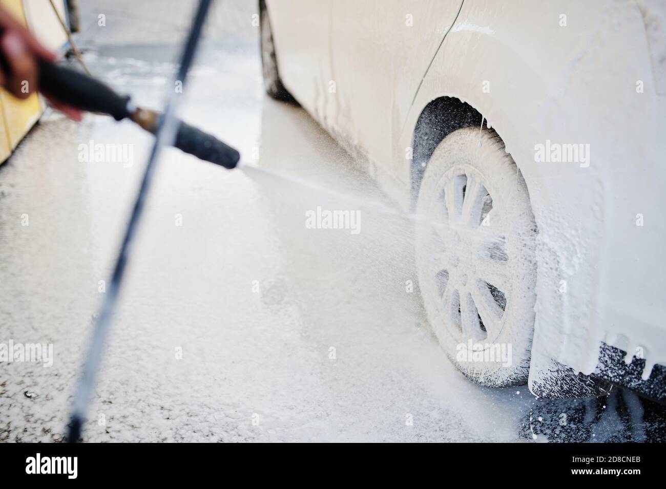 Washing white transportation on car wash Stock Photo - Alamy