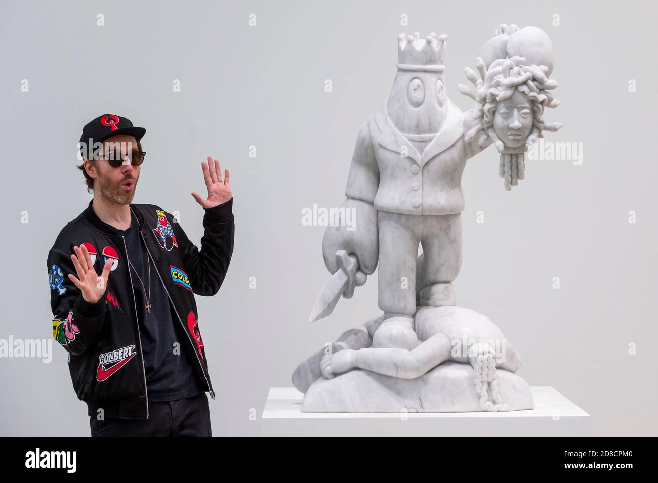 London, UK. 29 October 2020. Artist Philip Colbert poses with a marble ...