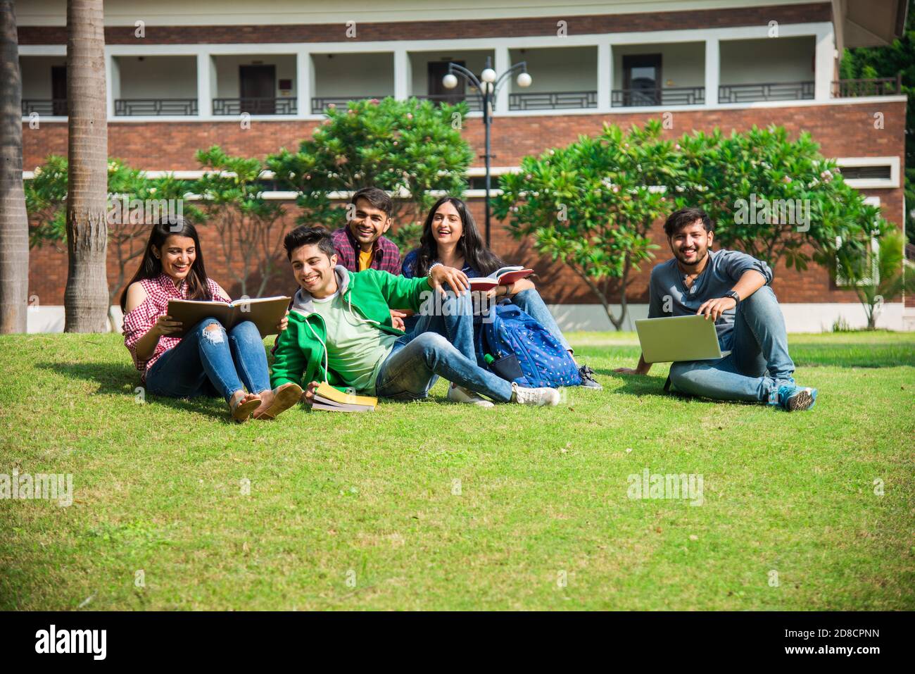 Indian College Students Group With Books