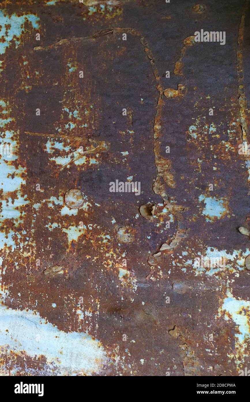 Old green iron sheet with peeling brown paint and rusty spots. Texture ...