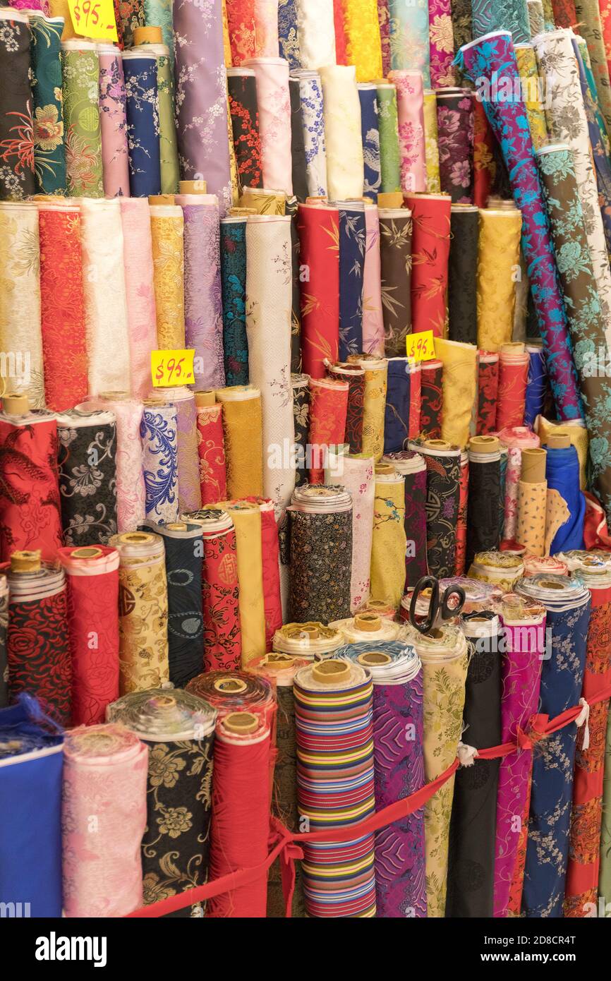 Colourful Textile Material in Rolls at Wholesaler Stock Photo - Alamy