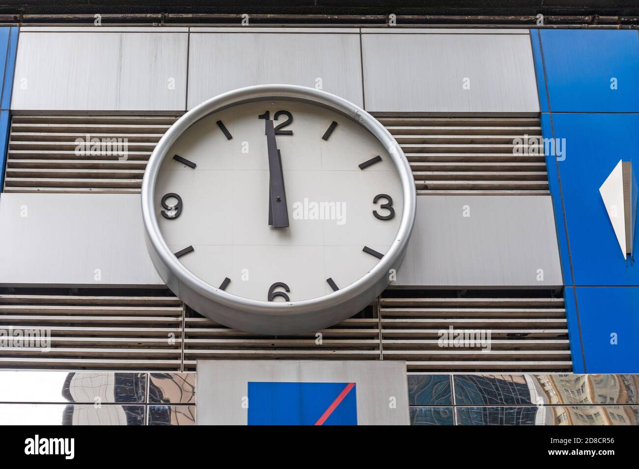 Big Round Analog Clock at Building in Hong Kong Stock Photo - Alamy