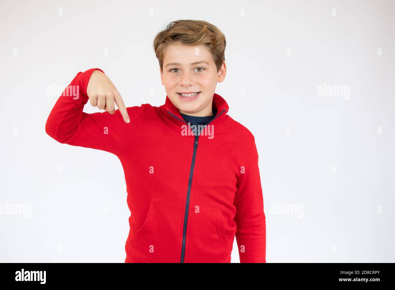 Little boy point down with finger, positive feeling Stock Photo - Alamy