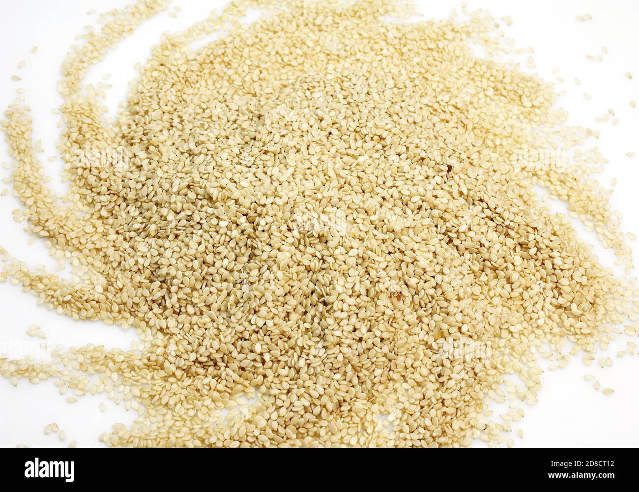 SESAME SEEDS AGAINST WHITE BACKGROUND Stock Photo - Alamy