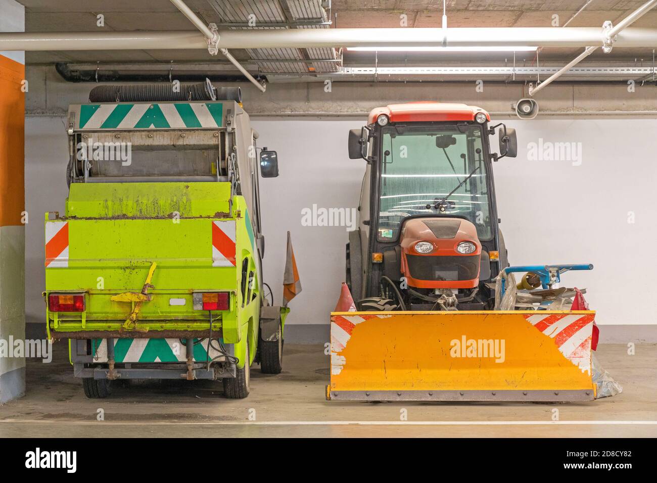 Snow Plow Tractor and Vacuum Cleaner Machine Stock Photo - Alamy