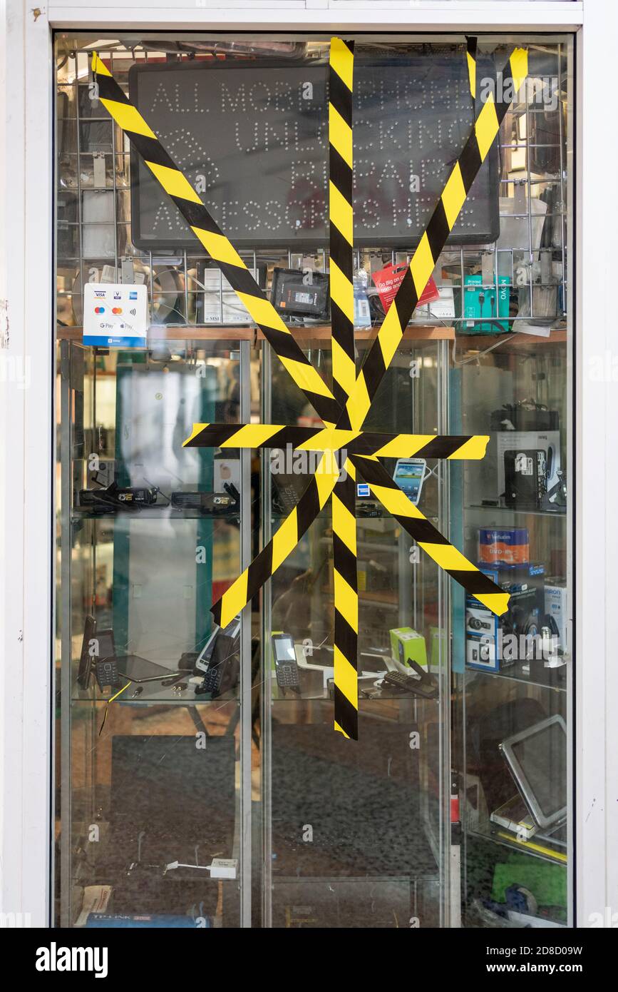 Broken store window Stock Photo - Alamy
