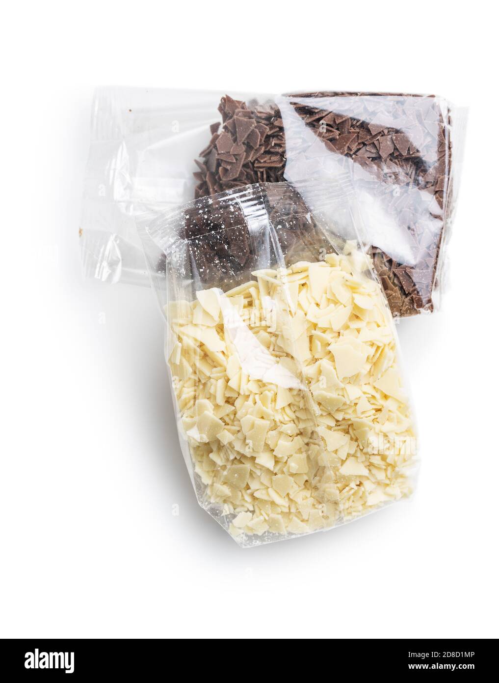 Grated white and dark chocolate. Chocolate flakes in plastic bags ...