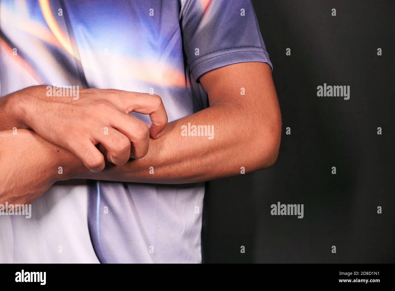 man suffering from itching skin, close up Stock Photo - Alamy