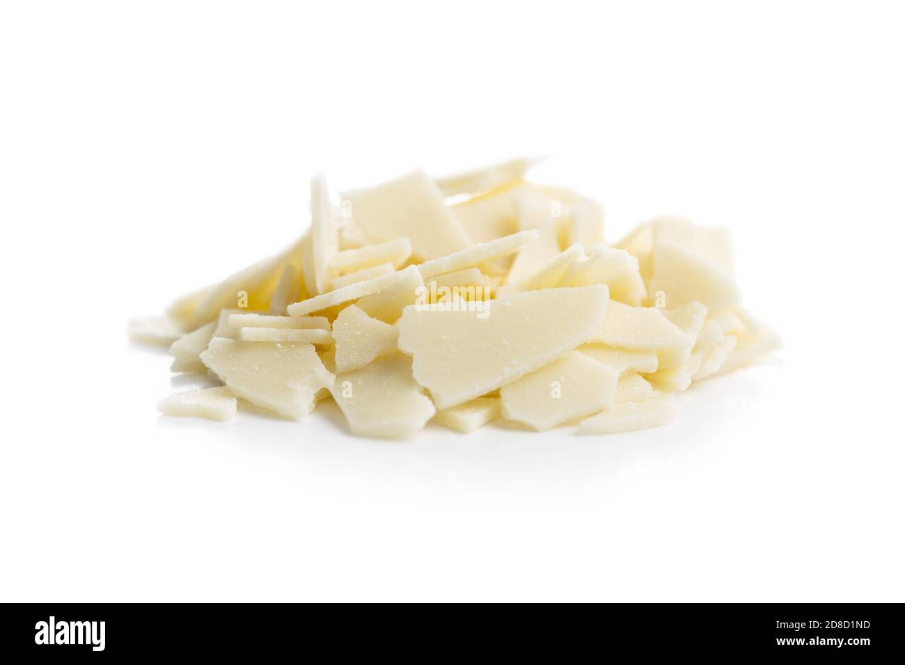Grated white chocolate. Chocolate flakes isolated on a white background ...