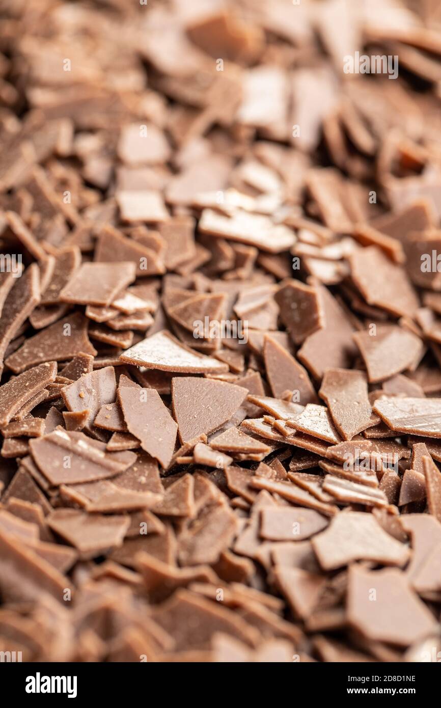 Grated dark chocolate. Chocolate flakes background Stock Photo - Alamy