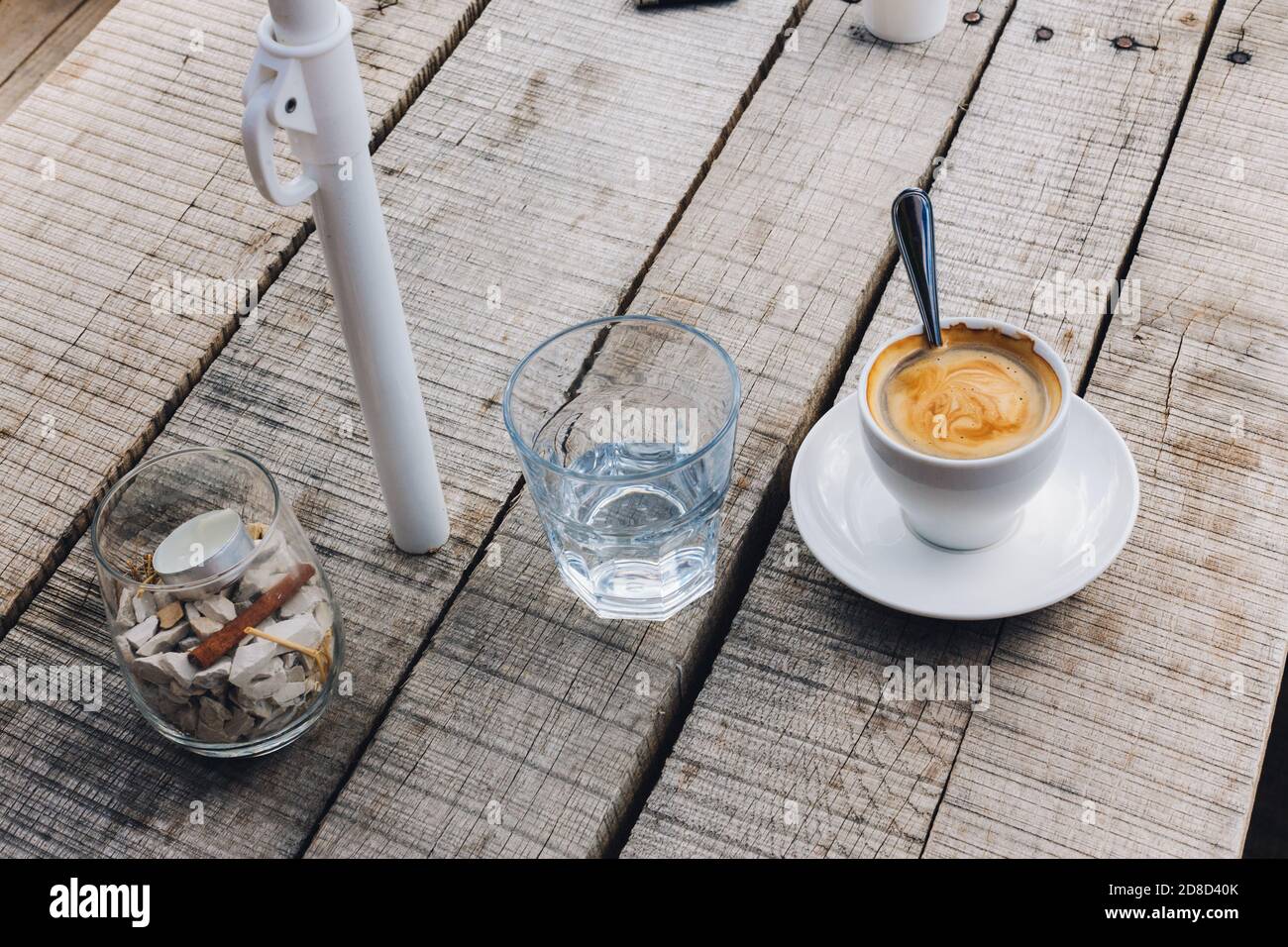 White coffee cup and water on plank rough texture wood table Stock ...