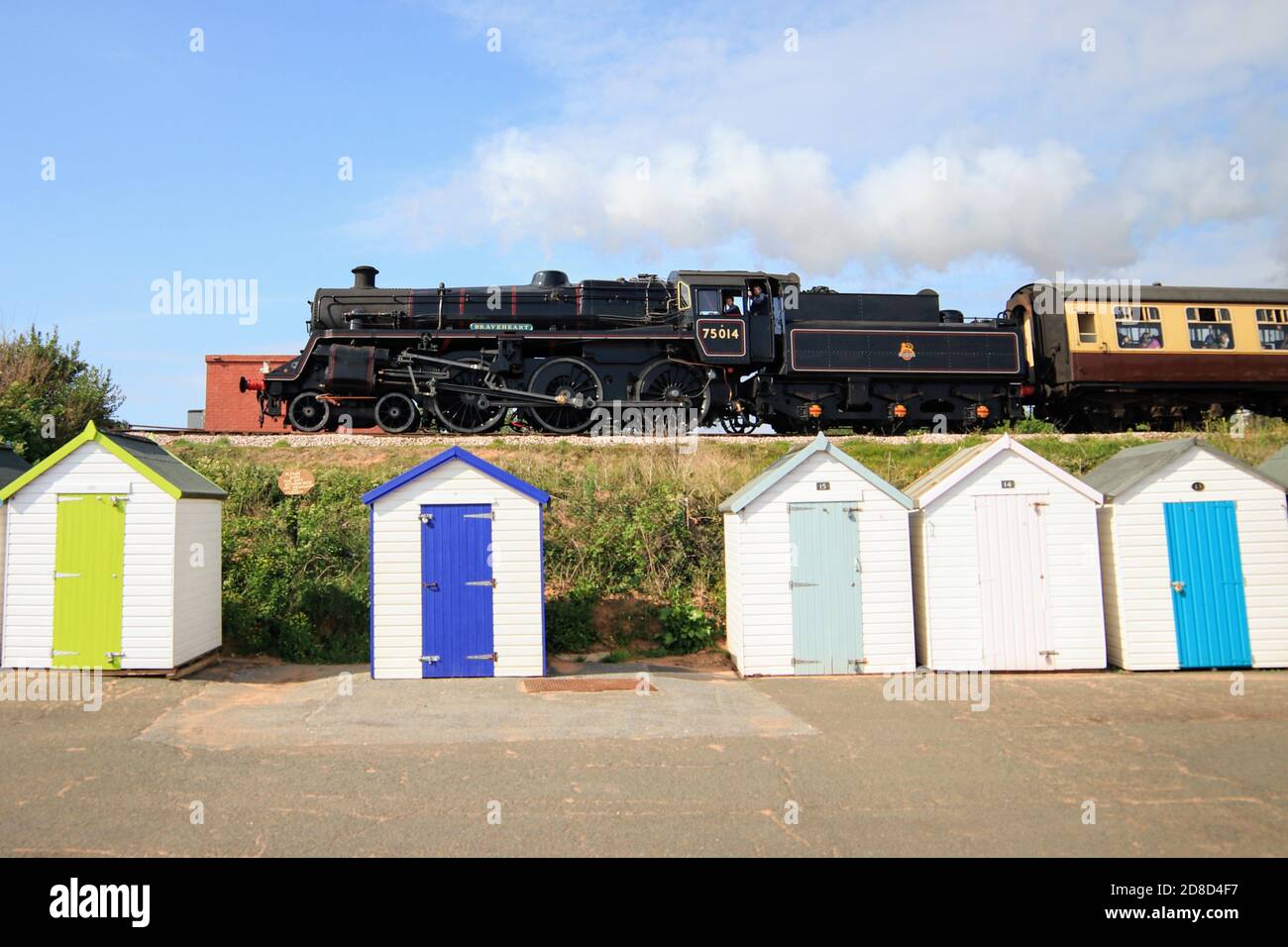 Steam train beach huts hi-res stock photography and images - Alamy