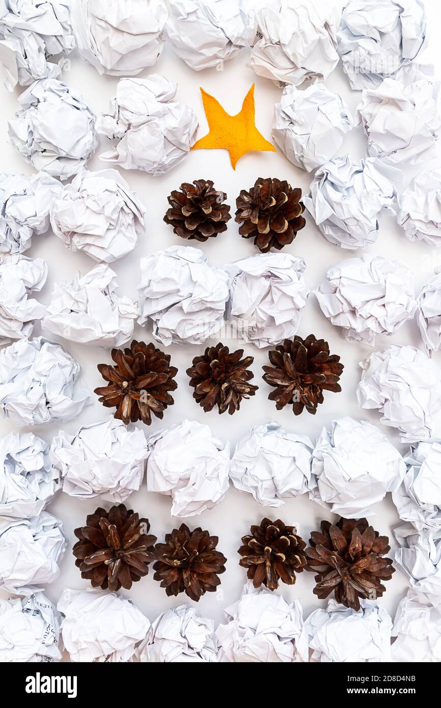 The Christmas tree is made of white paper crumpled into balls and pine ...