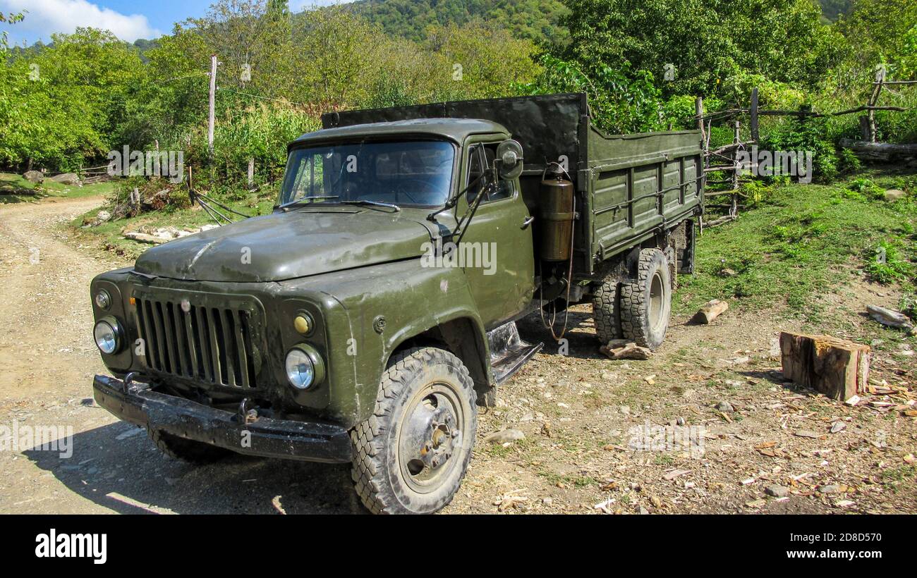 Old soviet-russian car in the rural Caucasian village Stock Photo - Alamy
