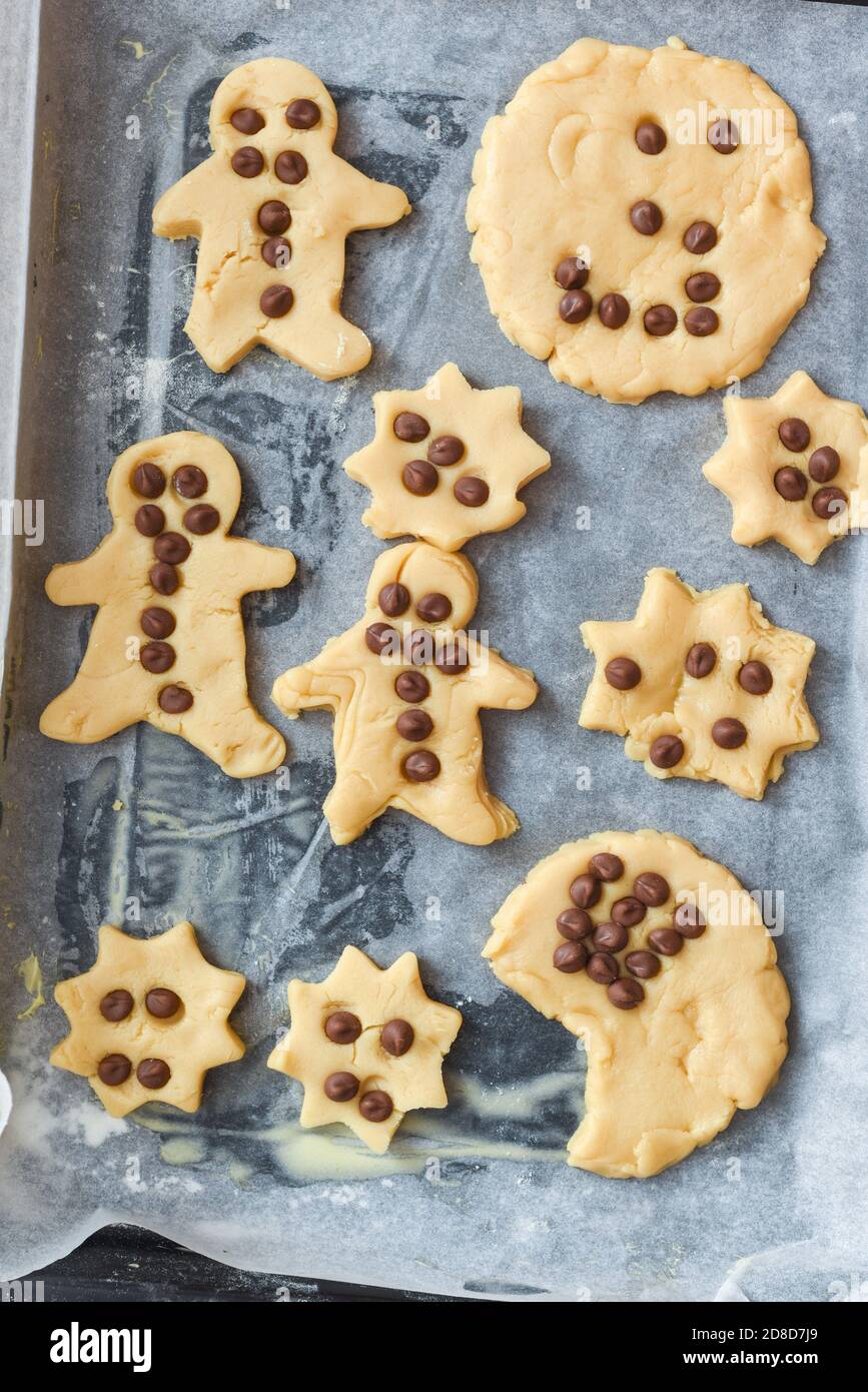 Kids are baking cookies in the kitchen the children are having fun ...