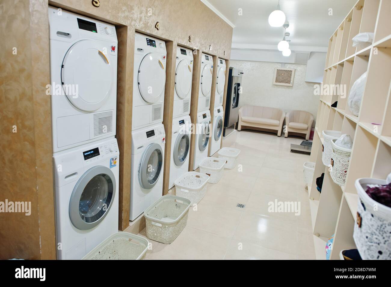 Washing machines in the self service laundry Stock Photo - Alamy