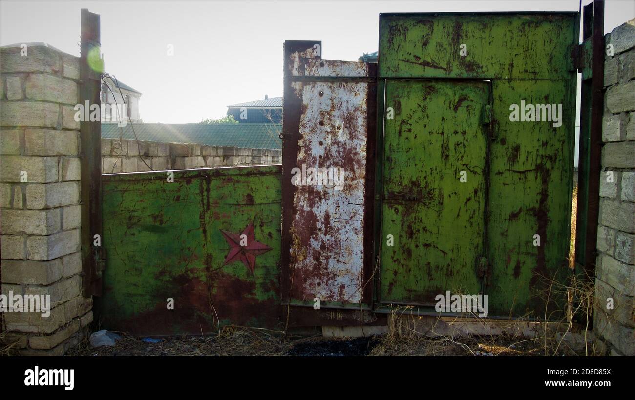Moscow, Russia - June 02, 2017: Old soviet gate with soviet red star ...