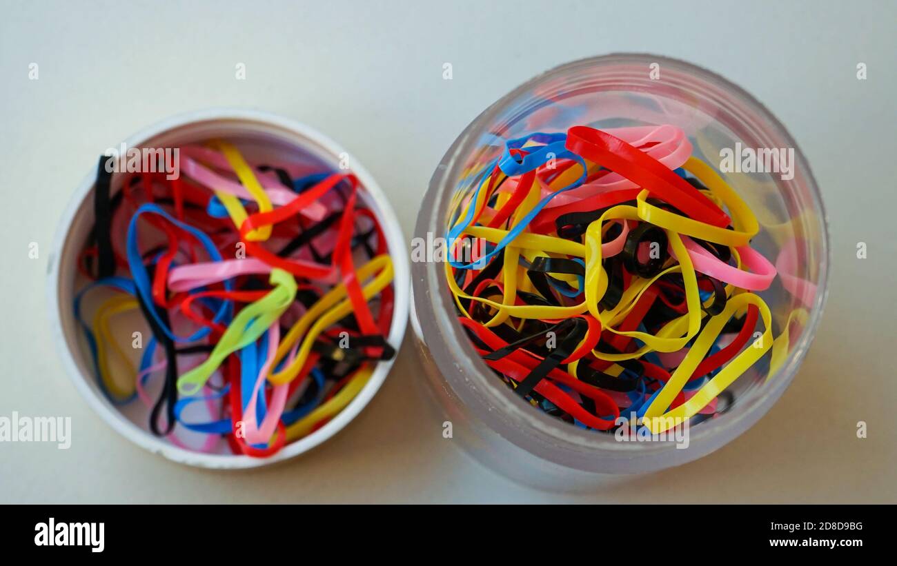 Close up of rubber band on white background Stock Photo - Alamy