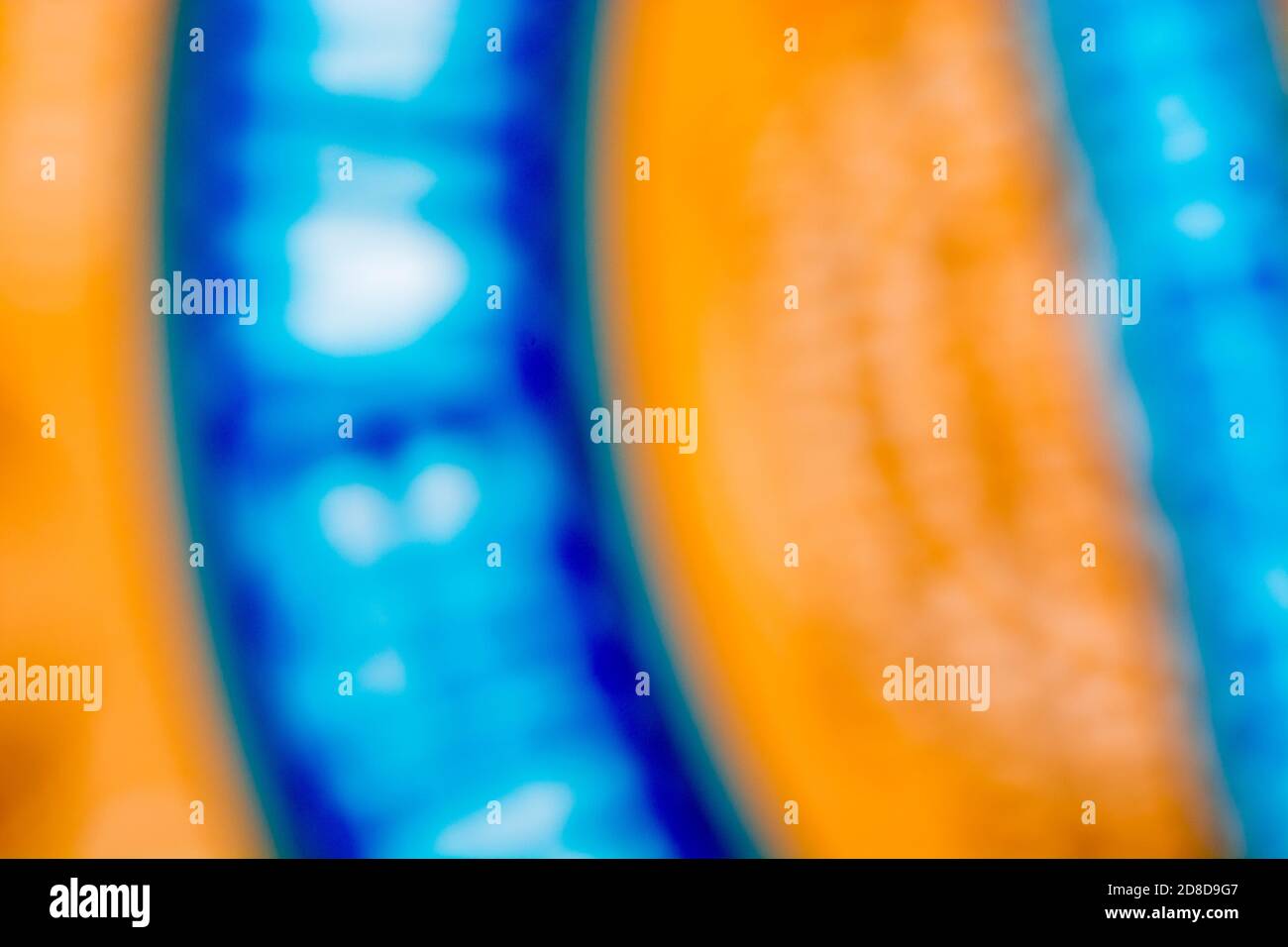 Vibrant soft focus abstract close-up of colourful labelling. For lack ...
