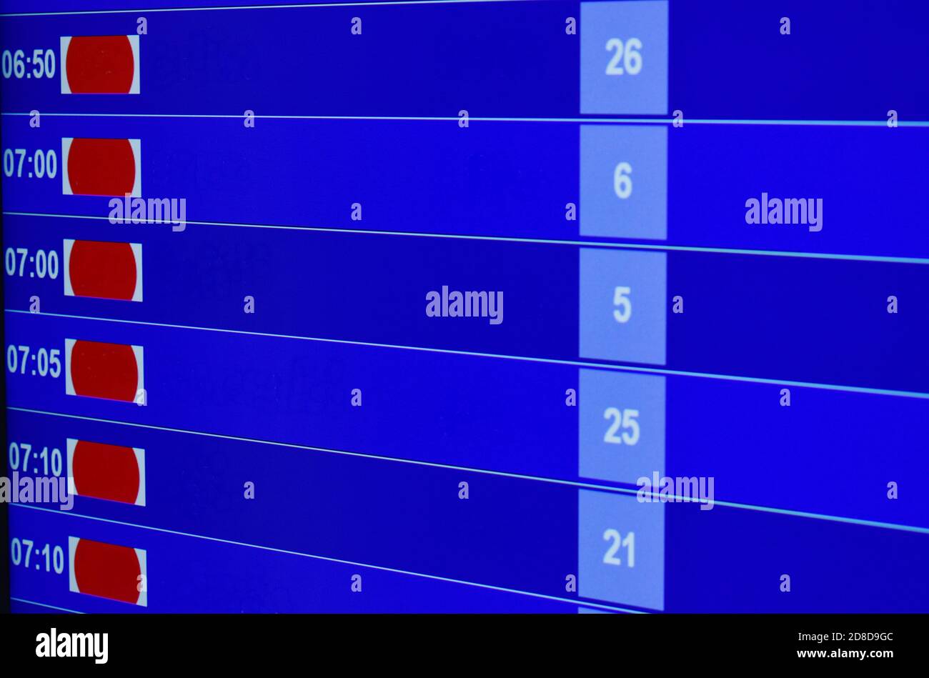 timetable showing and informed flight status in airport Stock Photo - Alamy
