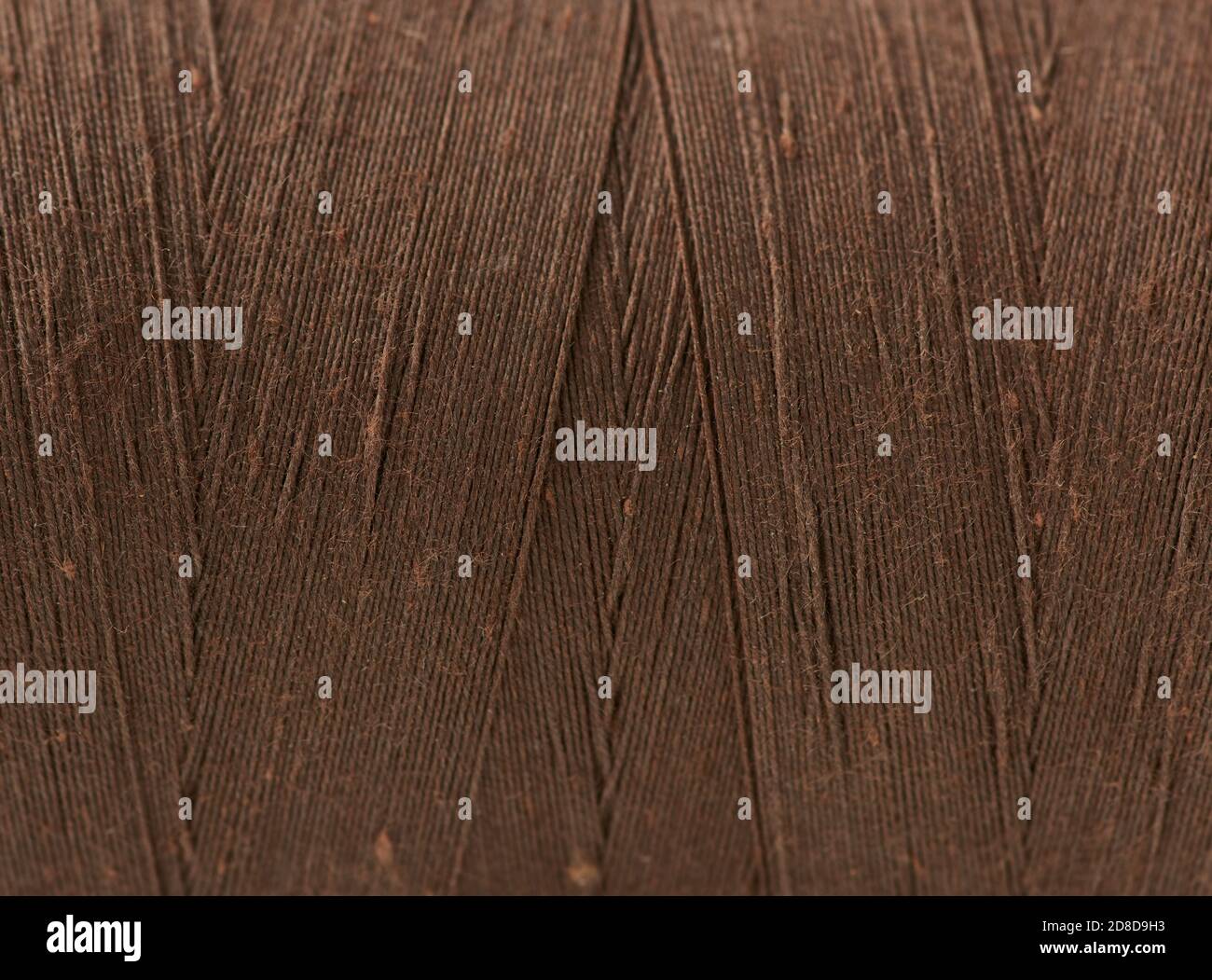 texture of brown spool of cotton thread, full frame Stock Photo - Alamy