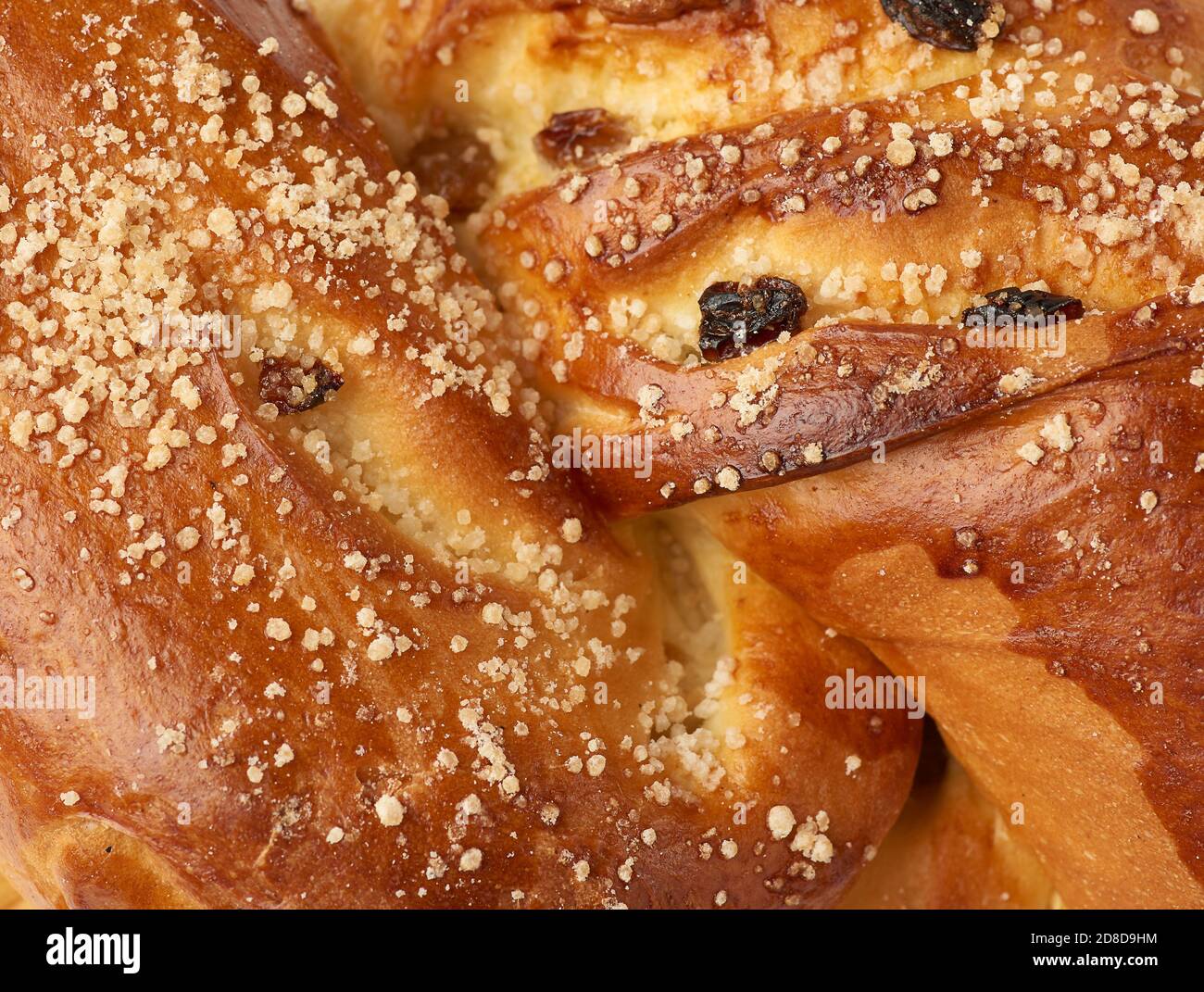 texture of baked sweet bun with raisins, full frame Stock Photo - Alamy