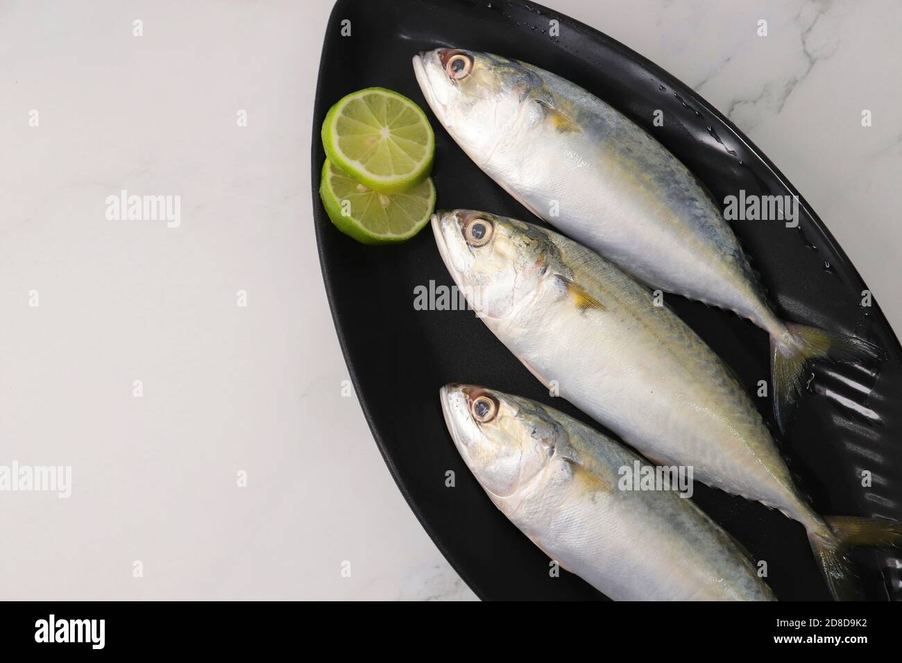 Uncooked Indian mackerel fish Rastrelliger kanagurta. also known as ...