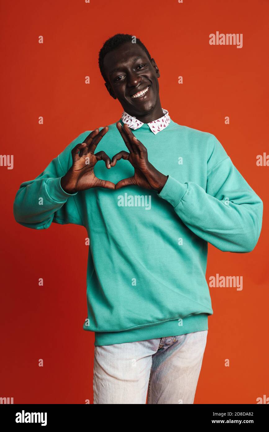 Happy Excited Afro American Man Showing Heart Gesture With Fingers