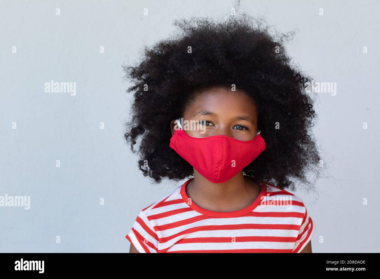 Portrait of girl wearing face mask Stock Photo - Alamy