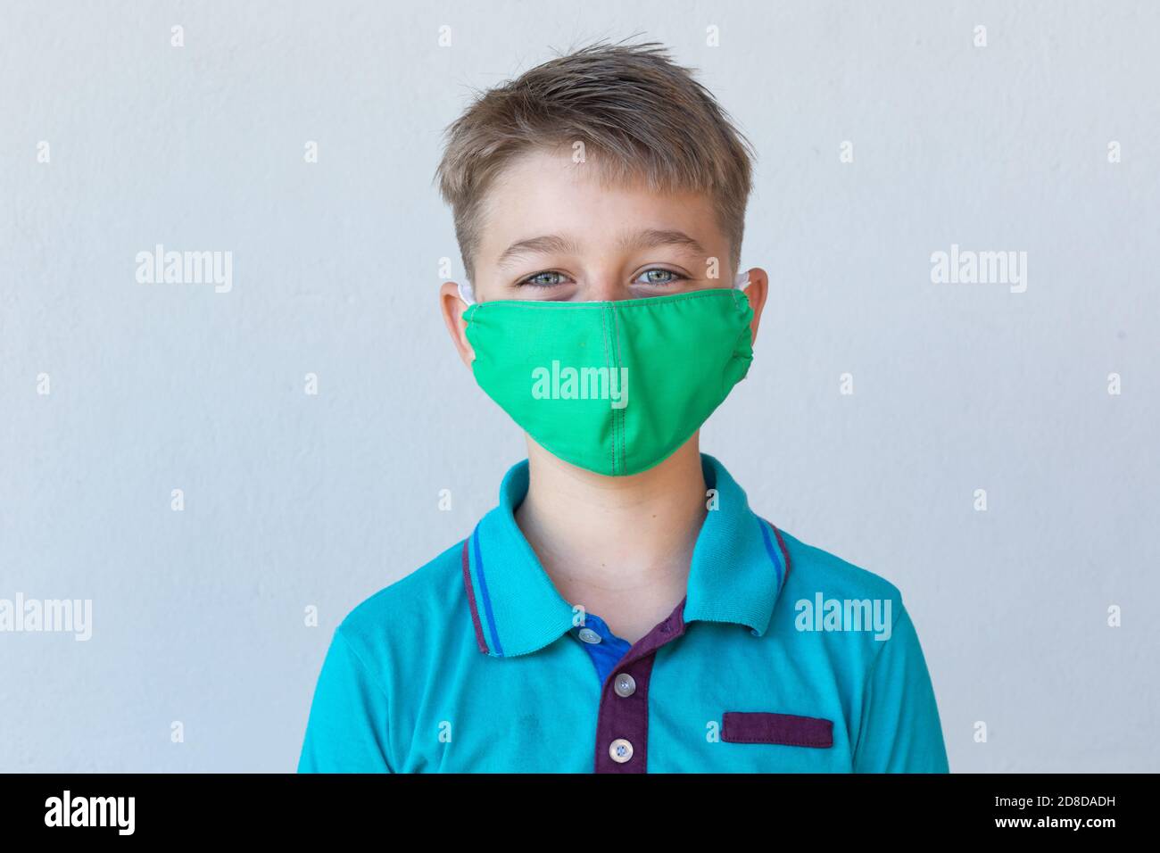 Portrait of boy wearing face mask Stock Photo - Alamy