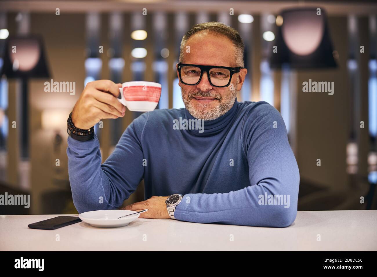 Lifted cup hi-res stock photography and images - Alamy