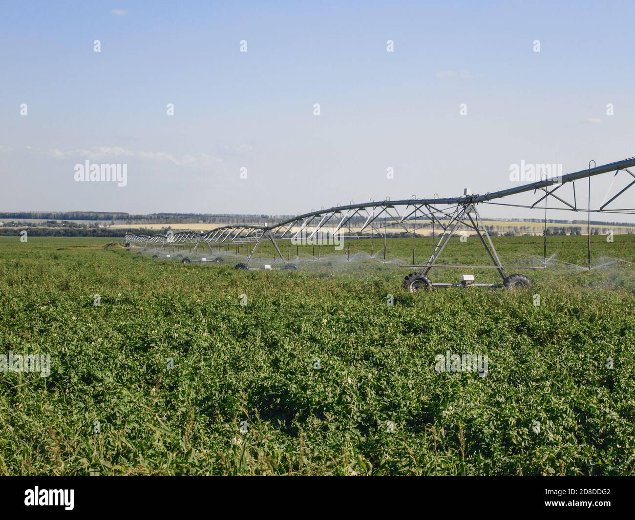Pivot water system on a farm field, agriculture irrigation machine ...