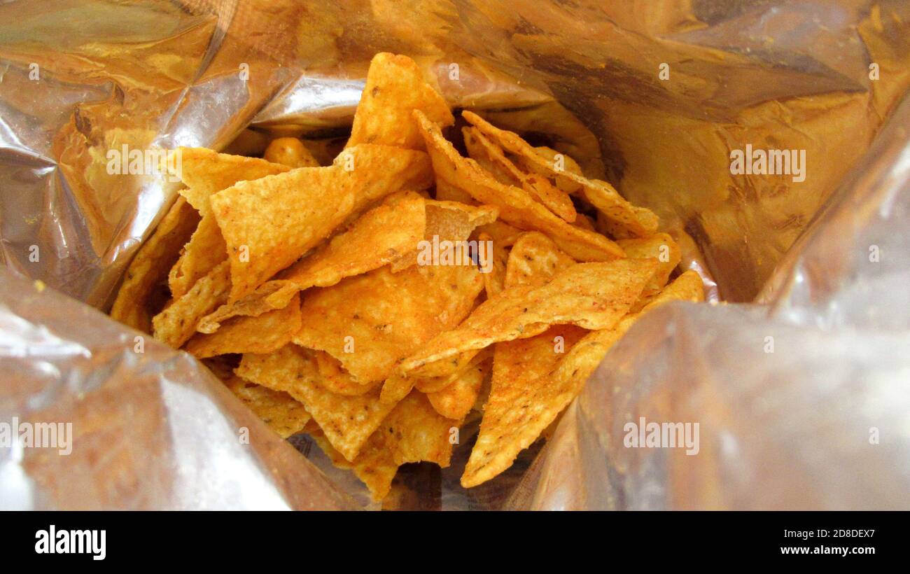 Close up, top view of a potato chips in a opened package Stock Photo ...