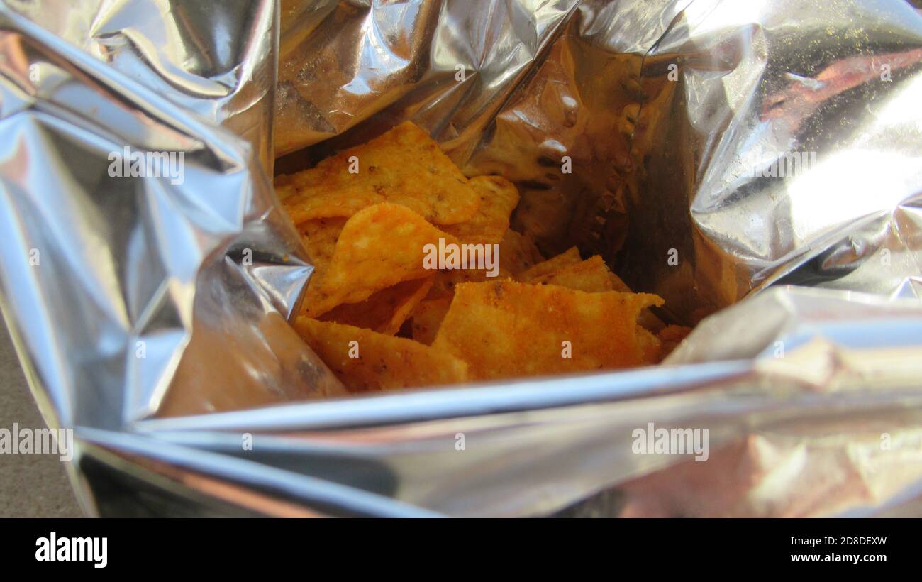Close up, top view of a potato chips in a opened package Stock Photo ...