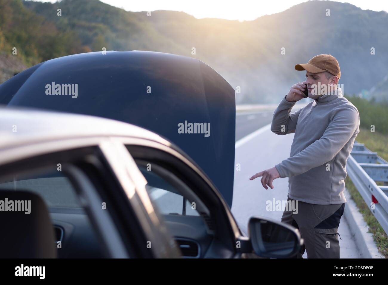 Businessman calling roadside assistance hi-res stock photography and ...