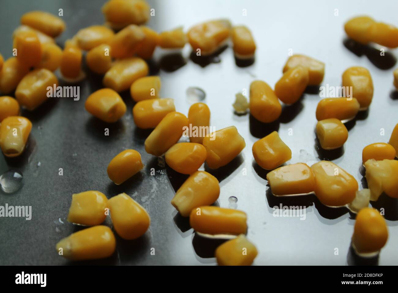 corn kernels on black dark background top view food background ...