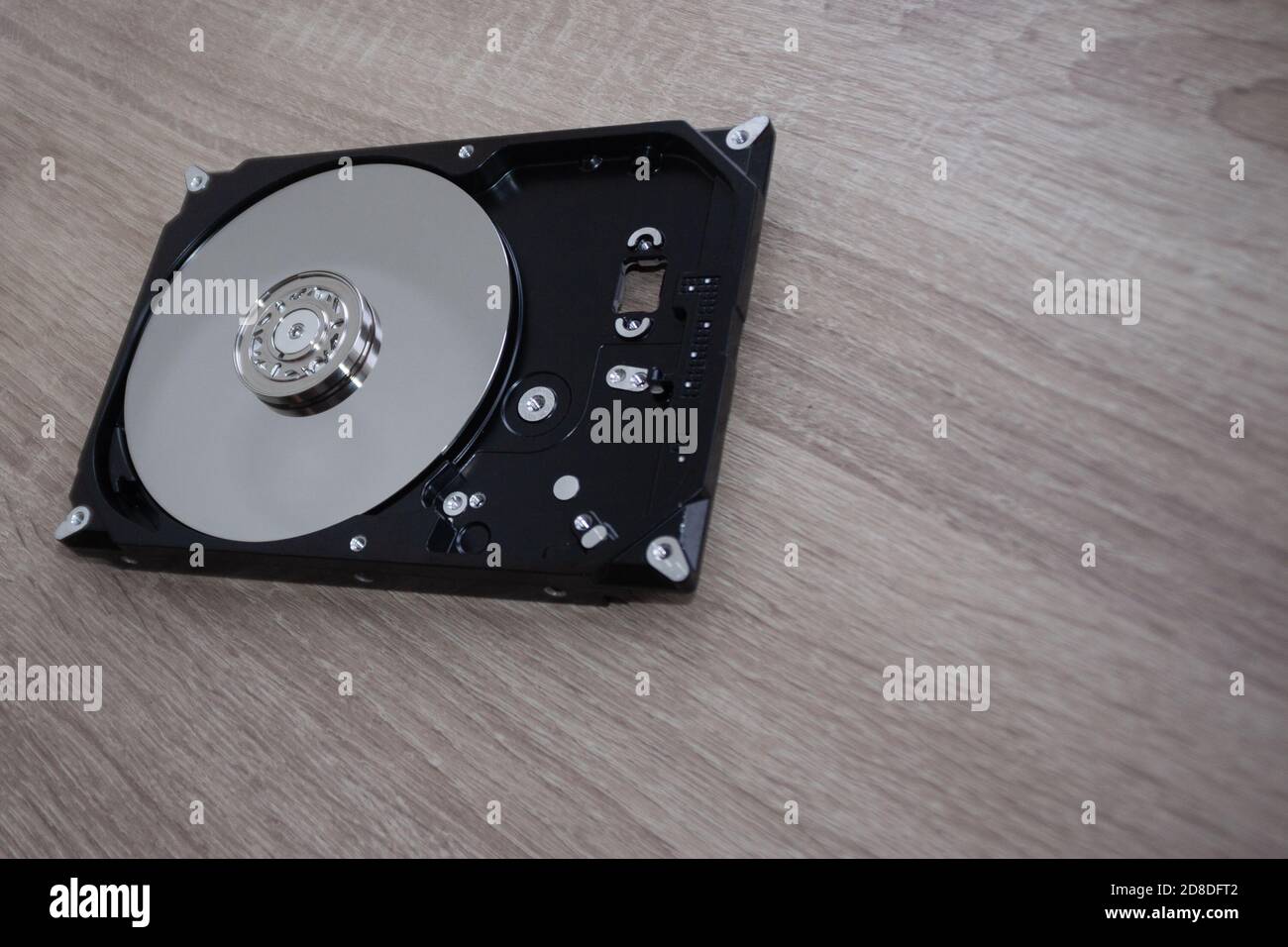 Disassembled computer hard drive device close-up. Dismantling ...