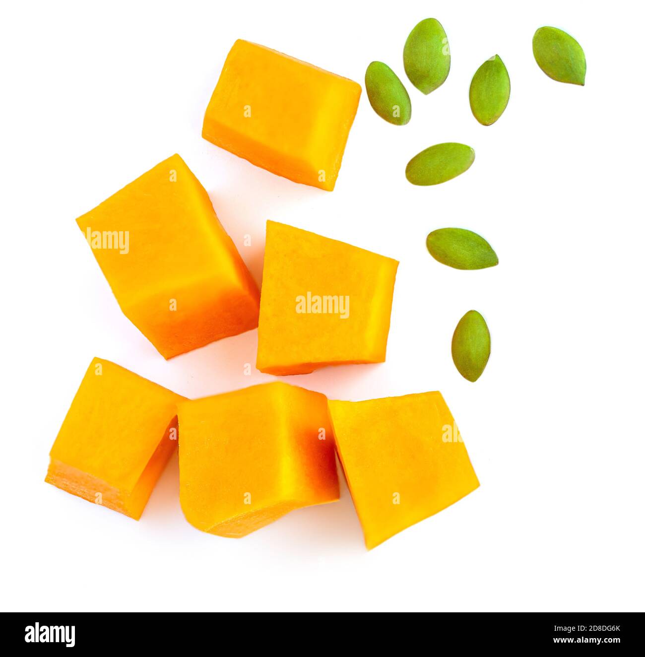 Diced Pumpkin isolated on white background. Pumpkin slices with seeds ...
